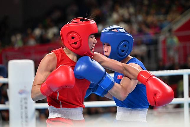 China's Wu, Wang claim clear victories in Asiad boxing debut | XINHUA ...